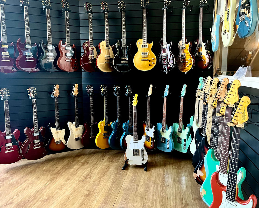 Explore Vintage Brand Electric Guitars